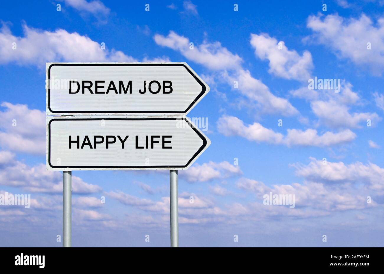Road sign to happy life and dream job Stock Photo - Alamy