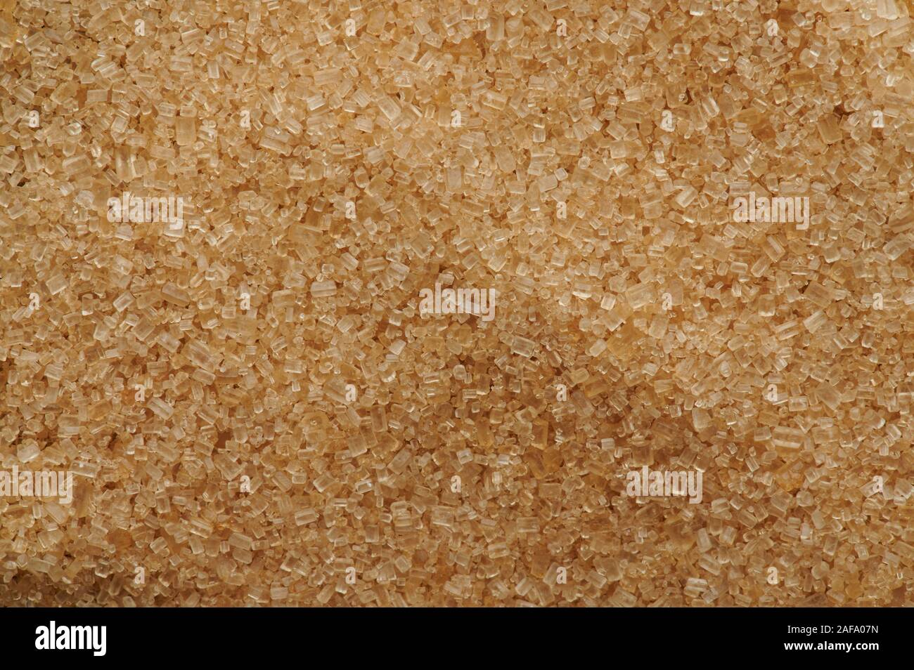 Texture of brown sugar granular macro close up view Stock Photo - Alamy