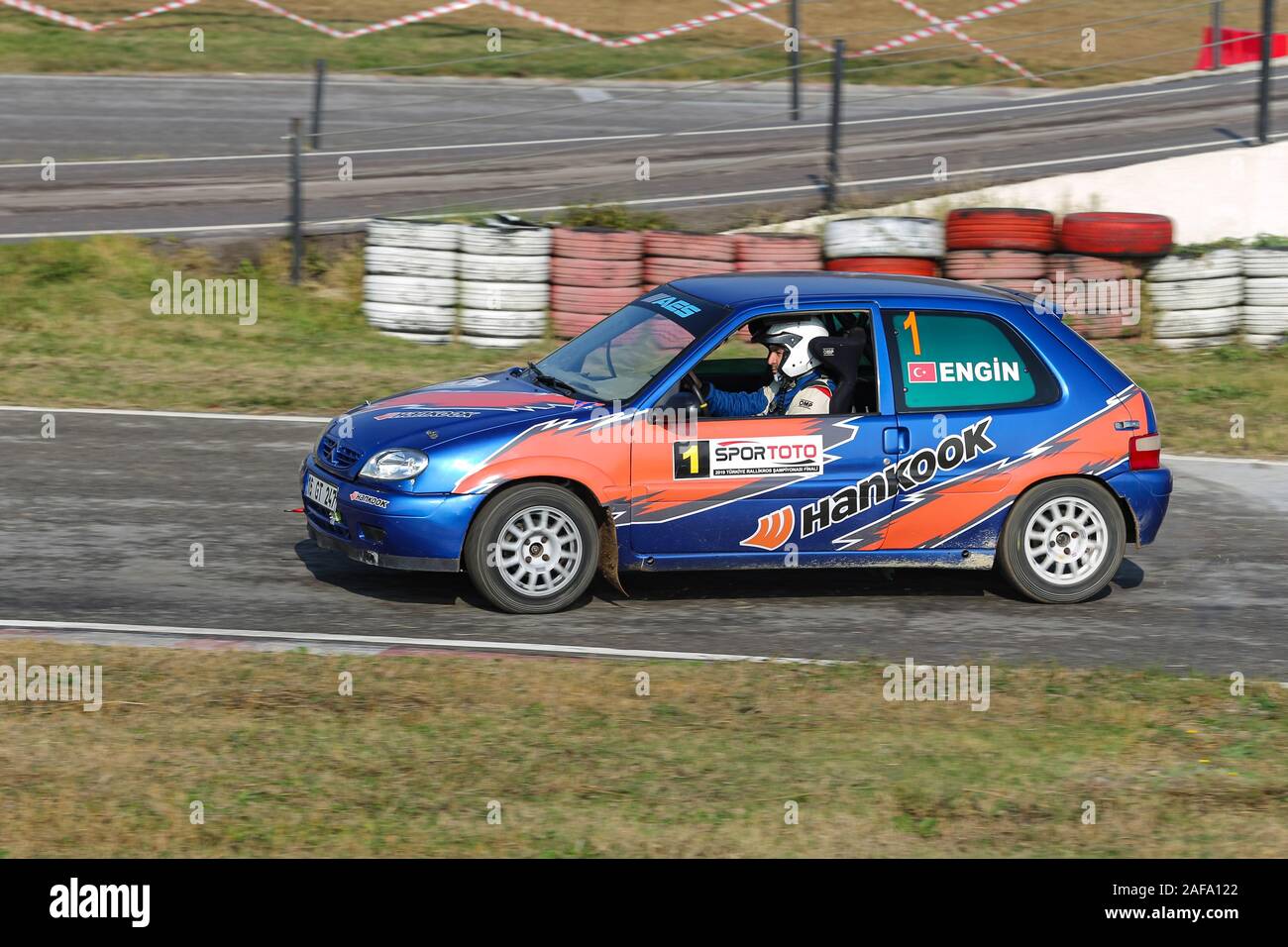 KOCAELI, TURKEY - NOVEMBER 24, 2019: Engin Apaydin drives Citroen Saxo ...