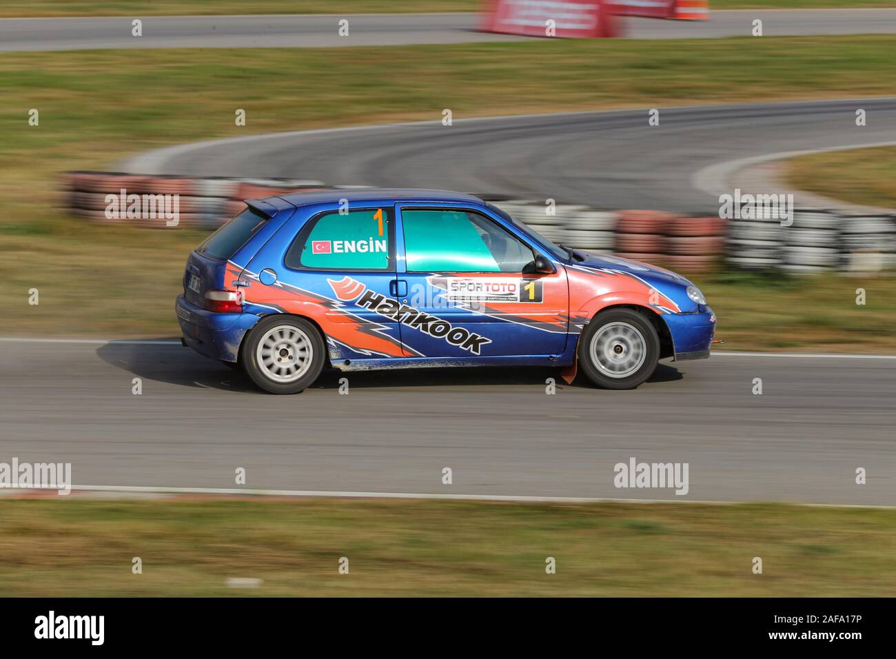 KOCAELI, TURKEY - NOVEMBER 24, 2019: Engin Apaydin drives Citroen Saxo ...
