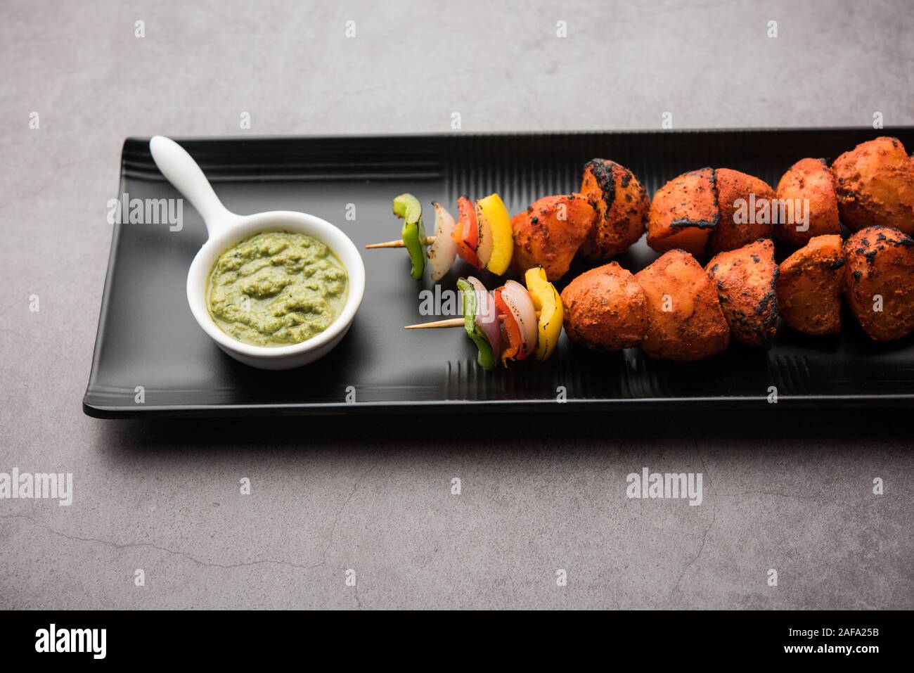 Tandoori aloo tikka or grilled barbecue potatoes Stock Photo - Alamy