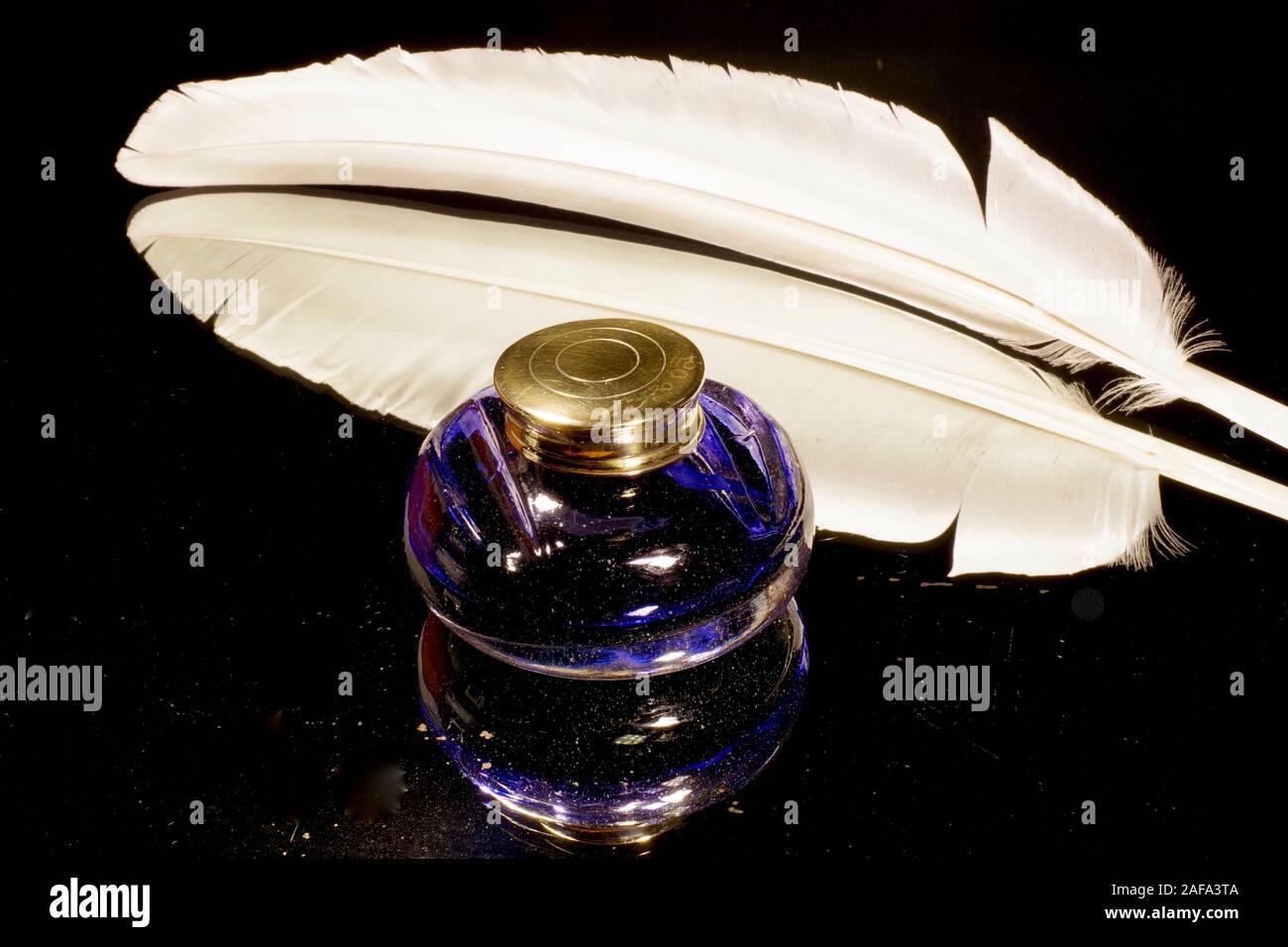 Antique Glass and Brass Ink Well with Blue Ink, and a Mute Swan Feather ...