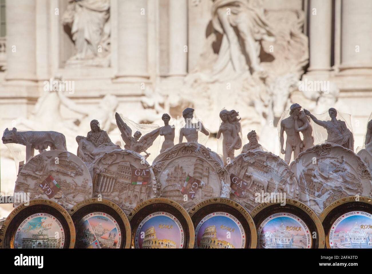 Plastic holiday souvenirs sold to tourists at the Trevi Fountain in ...
