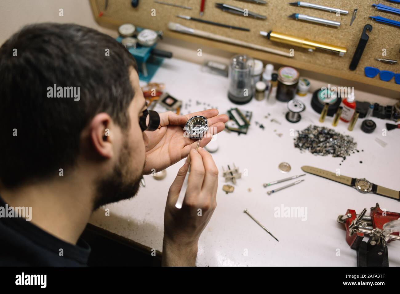 Watch repair desk hi-res stock photography and images - Alamy