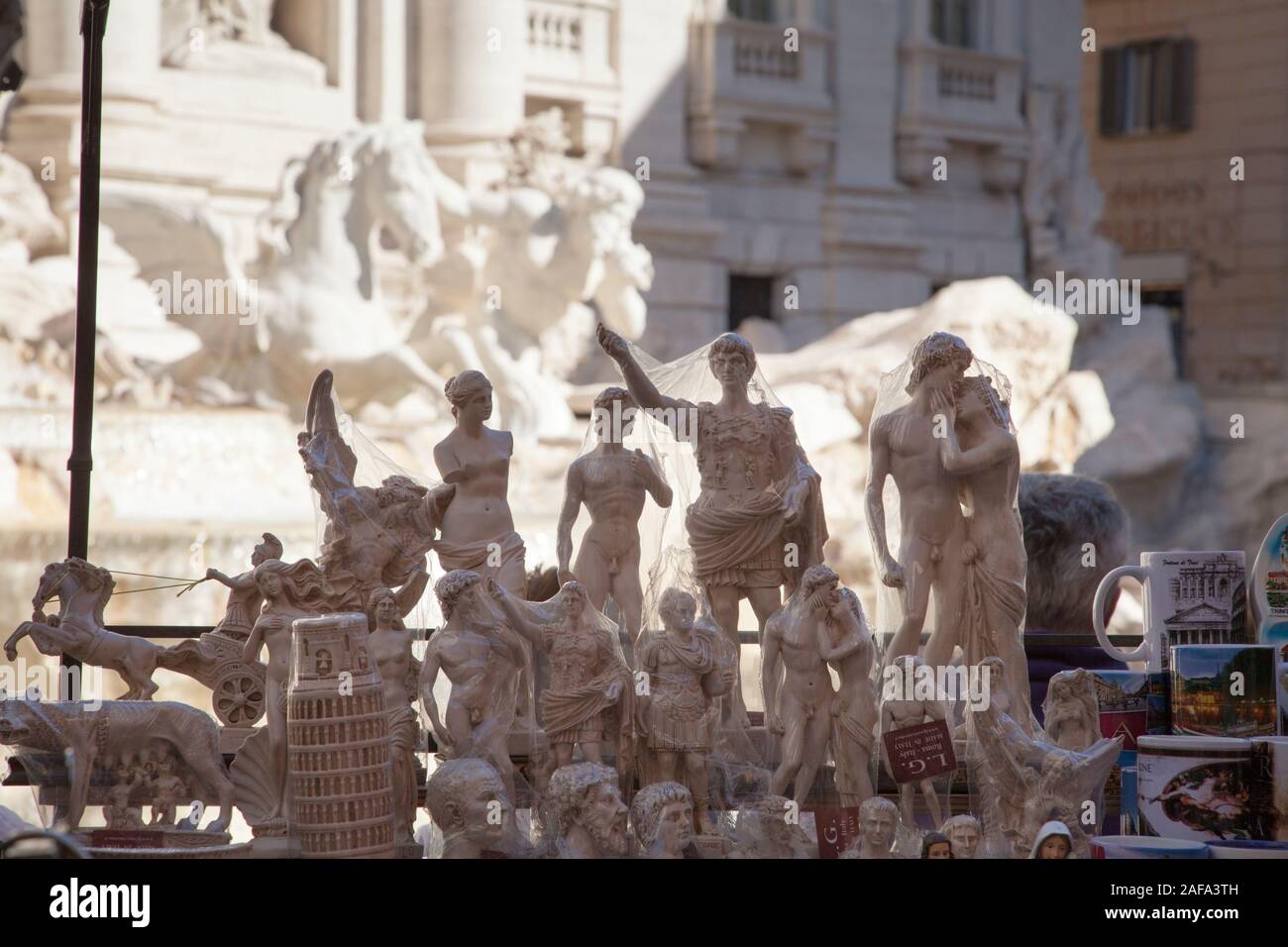 Plastic holiday souvenirs sold to tourists at the Trevi Fountain in ...