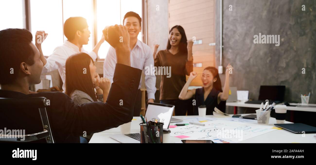 Group of Asian team creative business people Happy to be successful ...