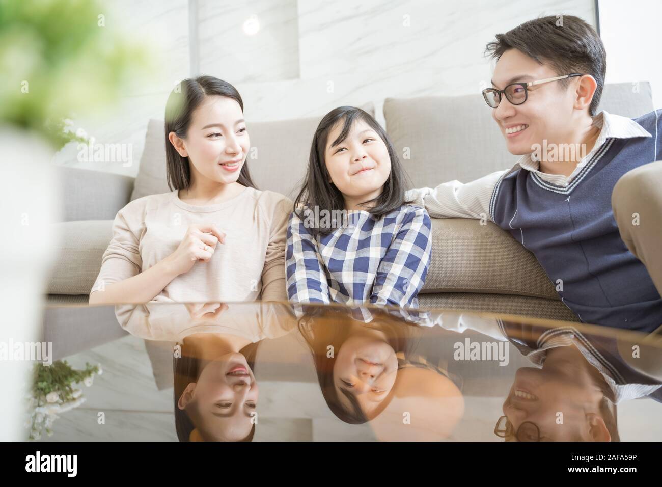 happy asian family spending time together in living room. family and ...