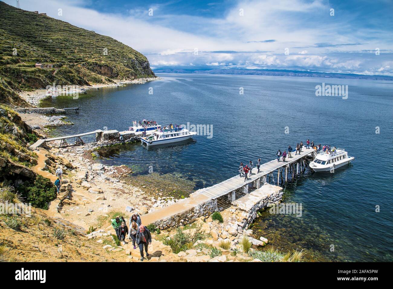 Isla del Sol Island , Bolivia- Jan 4, 2019: Tourists arrive on Isla del ...