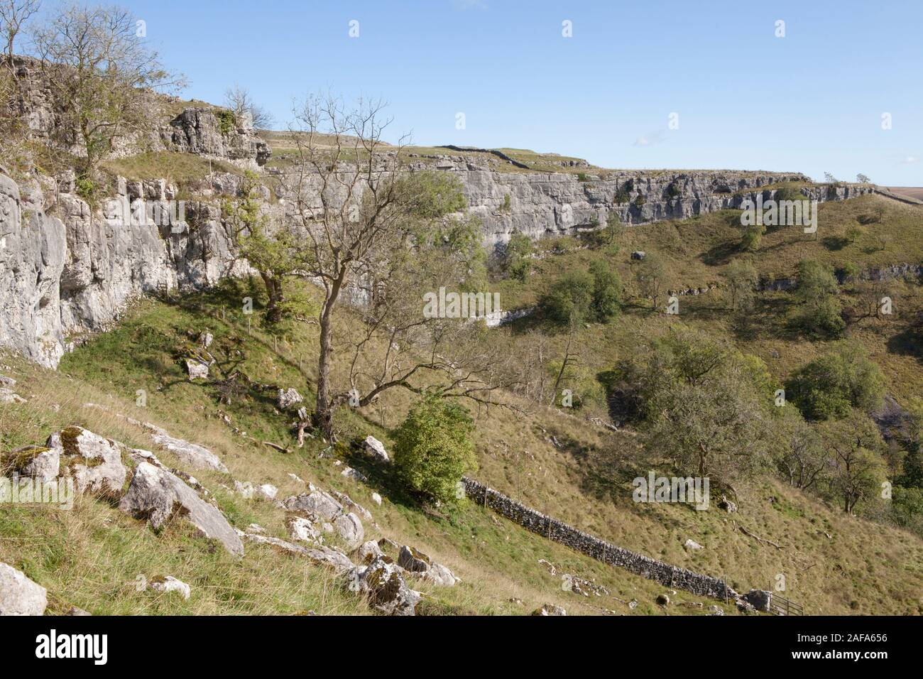 Malham Cove in Yorkshire Dales National Park is a dried up waterfall ...