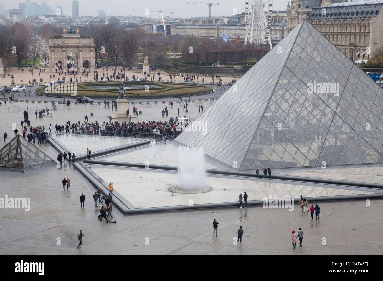The glass pyramid entrance in the courtyard of the Louvre Museum in ...