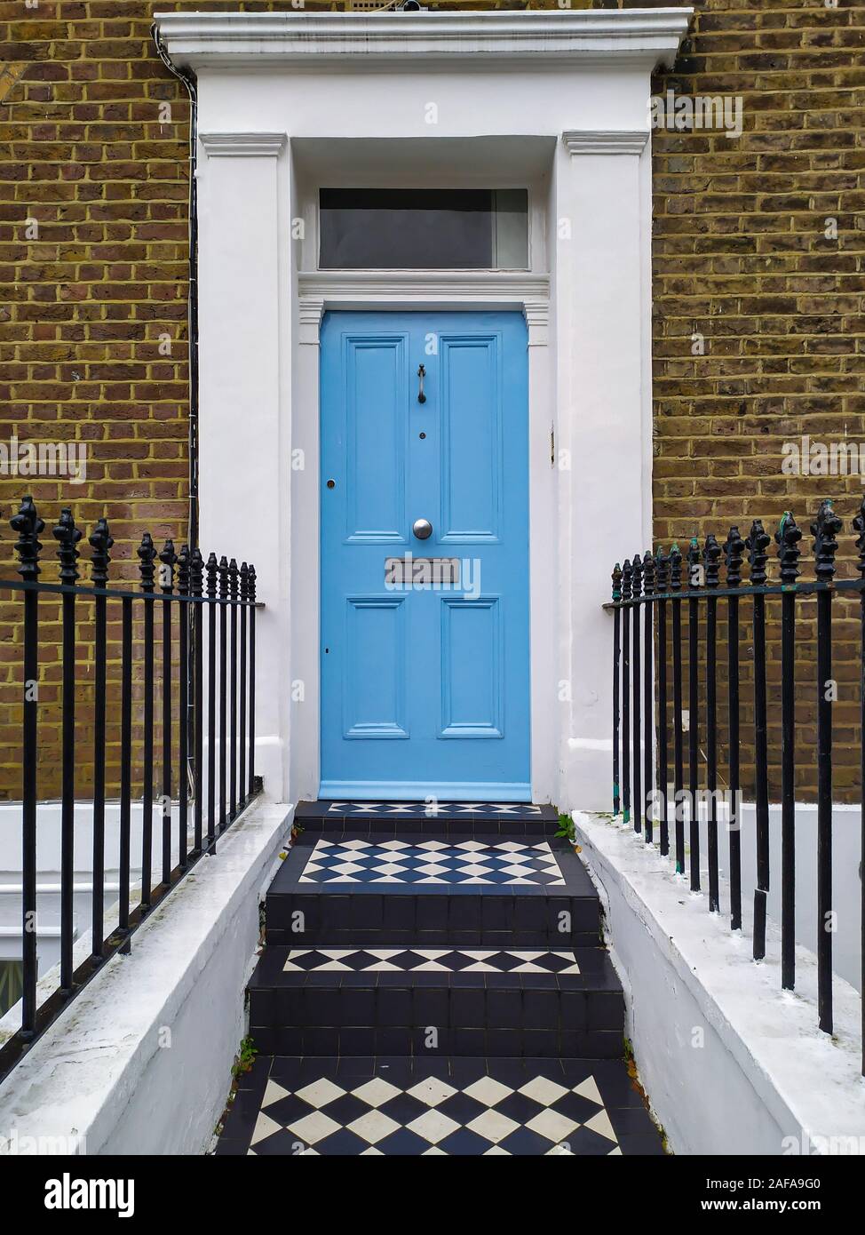 Light blue door in a doorway of London Nothing Hill area Stock Photo ...