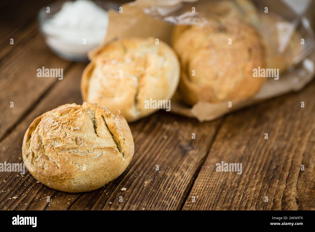 Fresh made German Buns on a vintage background as detailed close-up ...
