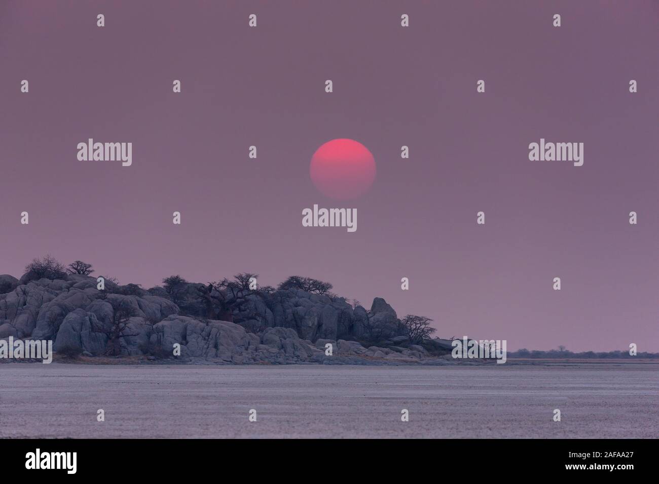 Sunset at Kubu island in white salt pan, Sowa pan, Sua pan ...