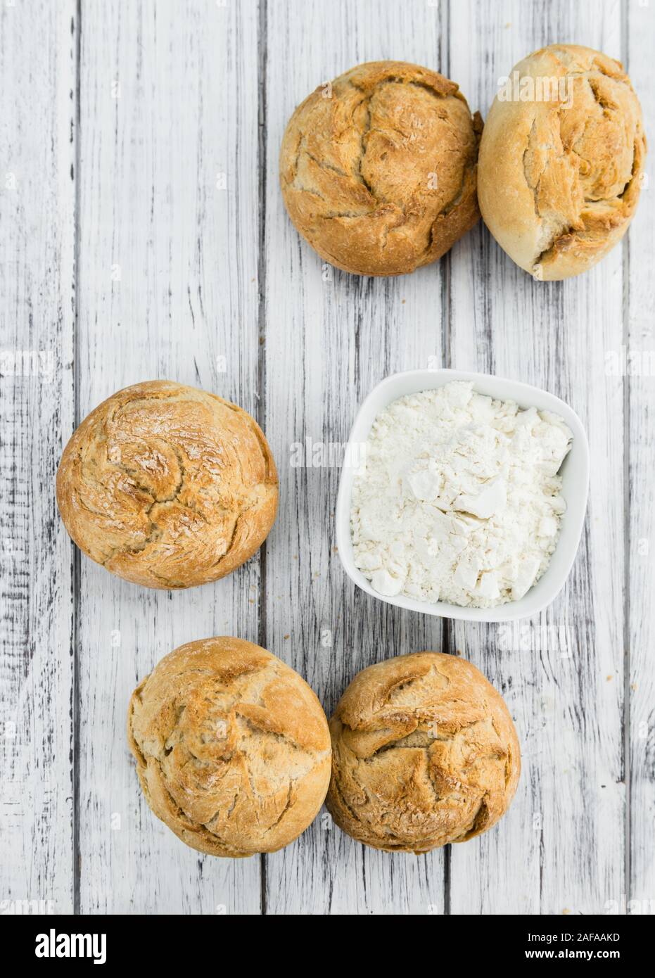 Fresh made German Buns on a vintage background as detailed close-up ...