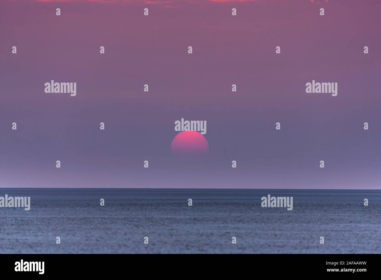 Sunset at Kubu island, white salt pan, Sowa pan(Sua pan), Makgadikgadi ...