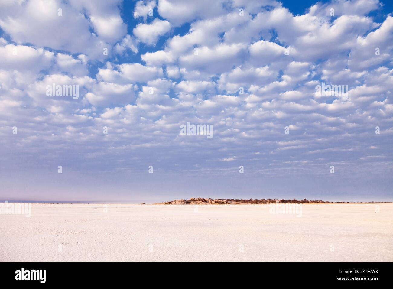 Scale clouds and Kubu island, white salt pan, Sowa pan(Sua pan ...