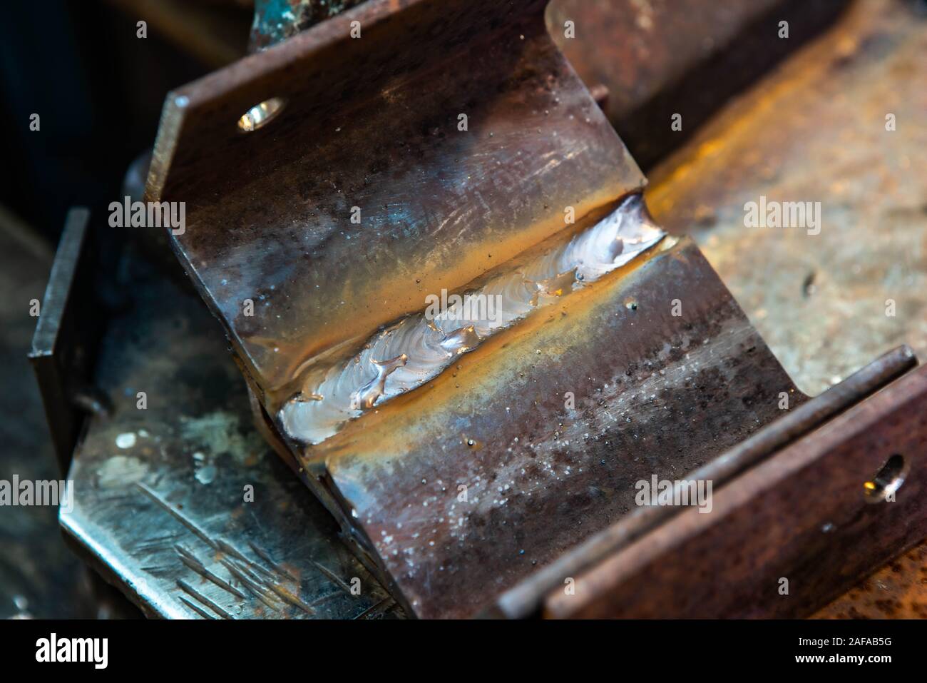Close up of smooth the welding seam. Electric welding. The industry of ...