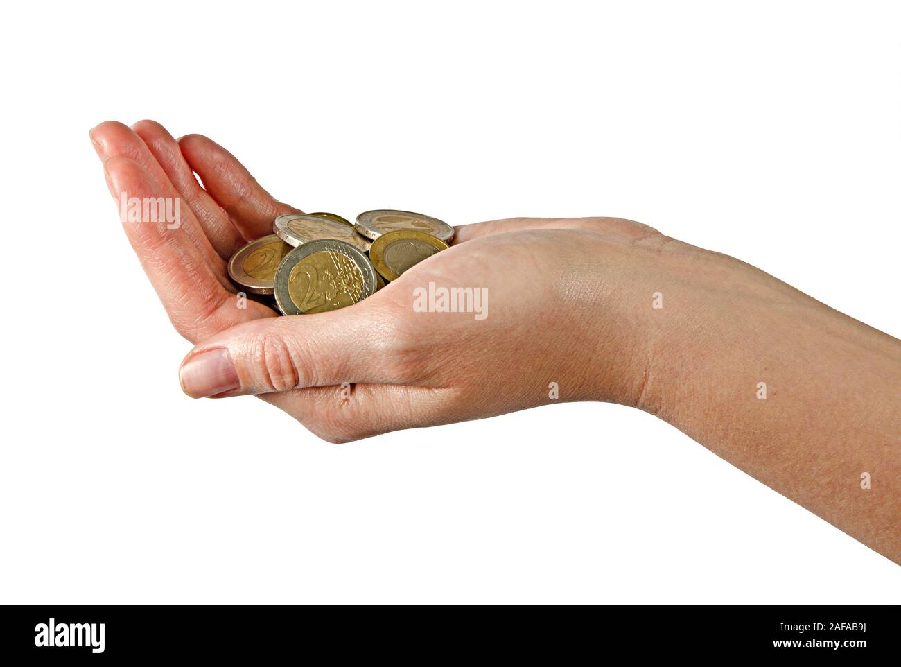 Hand holding euro coins Cut Out Stock Images & Pictures - Alamy