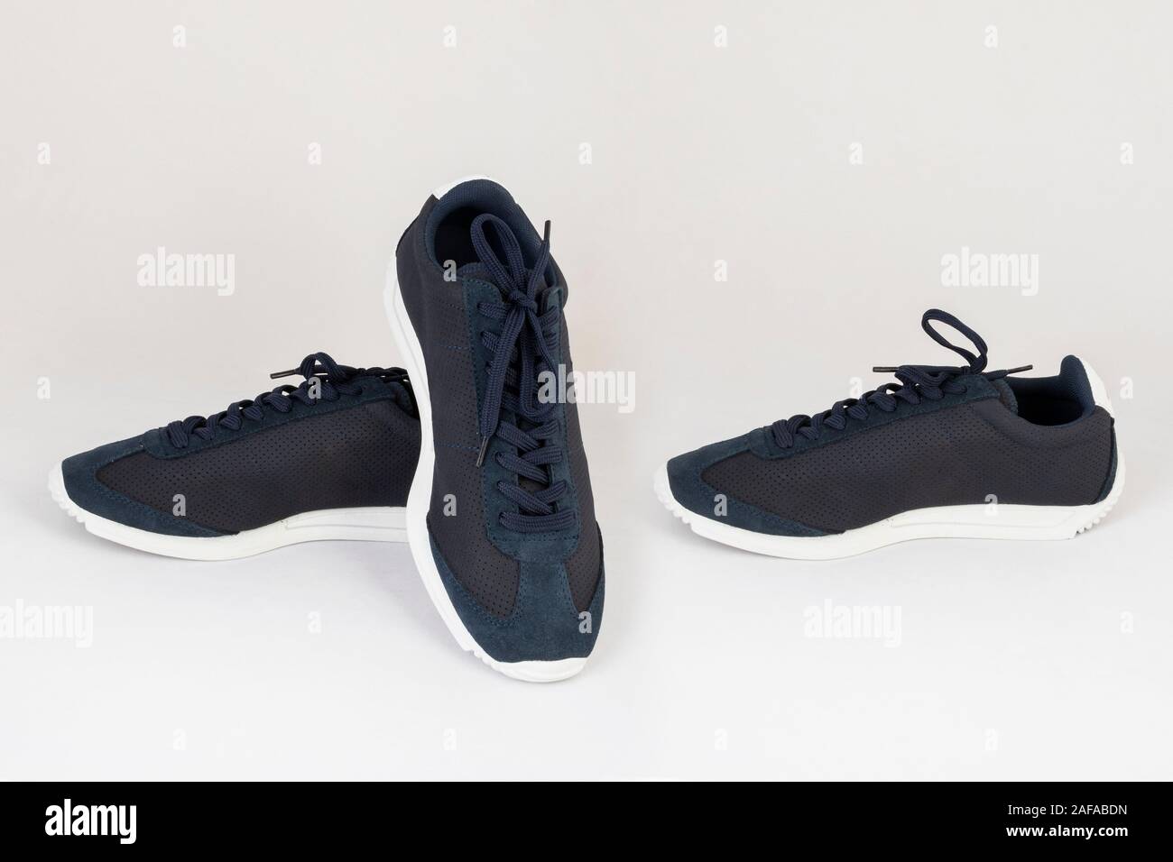 dark blue sneakers shoes isolated on white background side and front ...