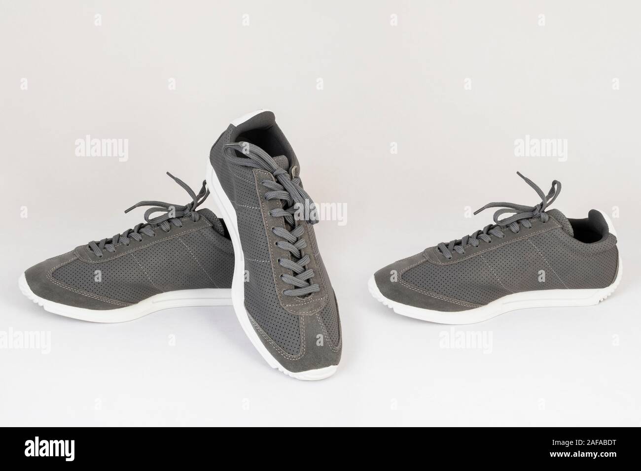 gray sneakers shoes isolated on white background side and front view ...