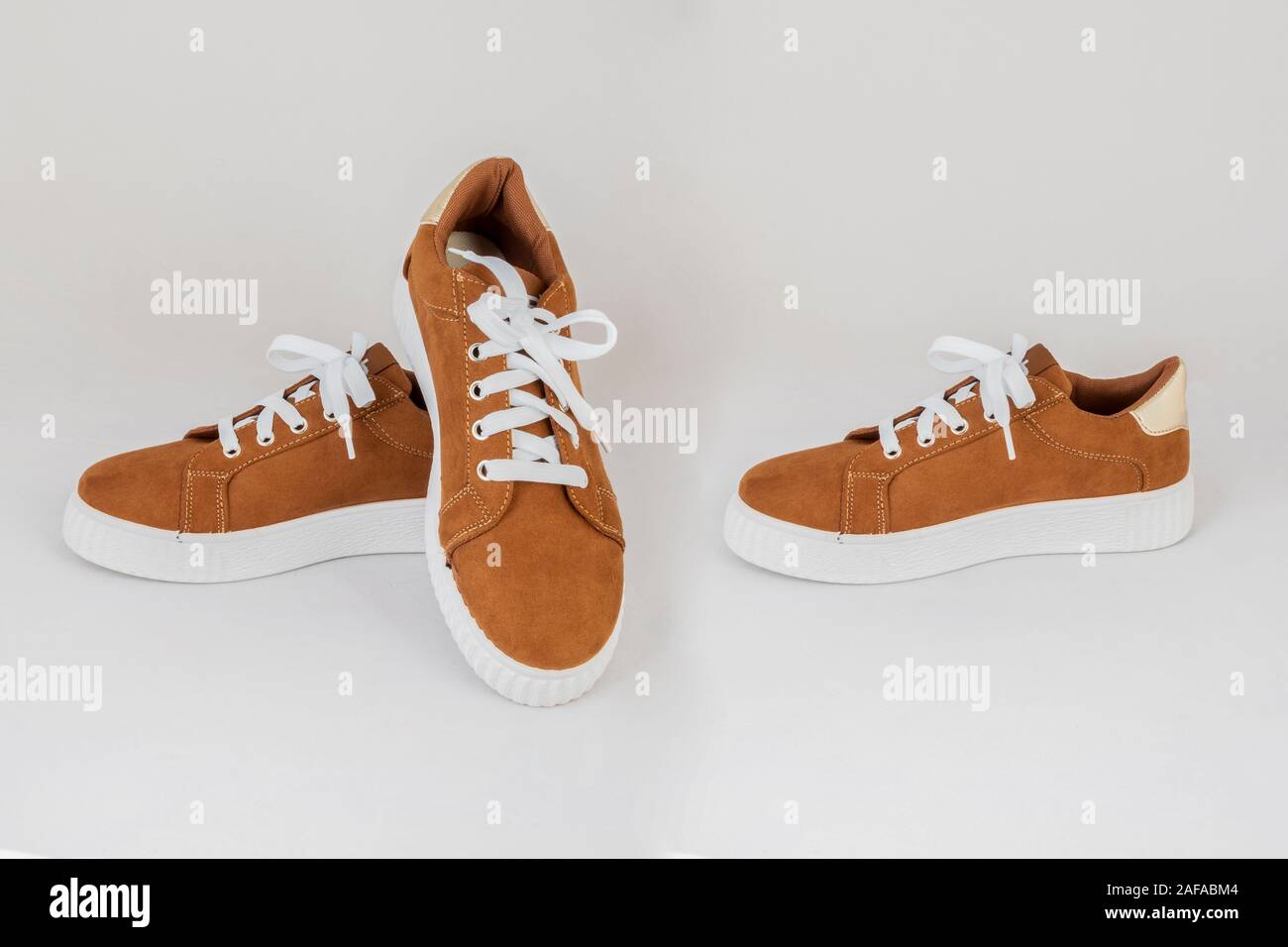 brown sneakers shoes isolated on white background side and front view ...