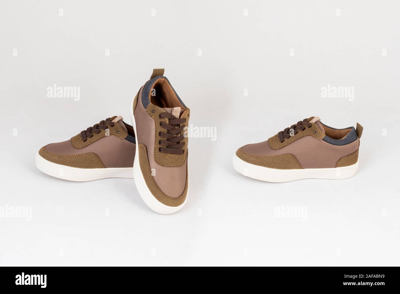 brown sneakers shoes isolated on white background side and front view ...