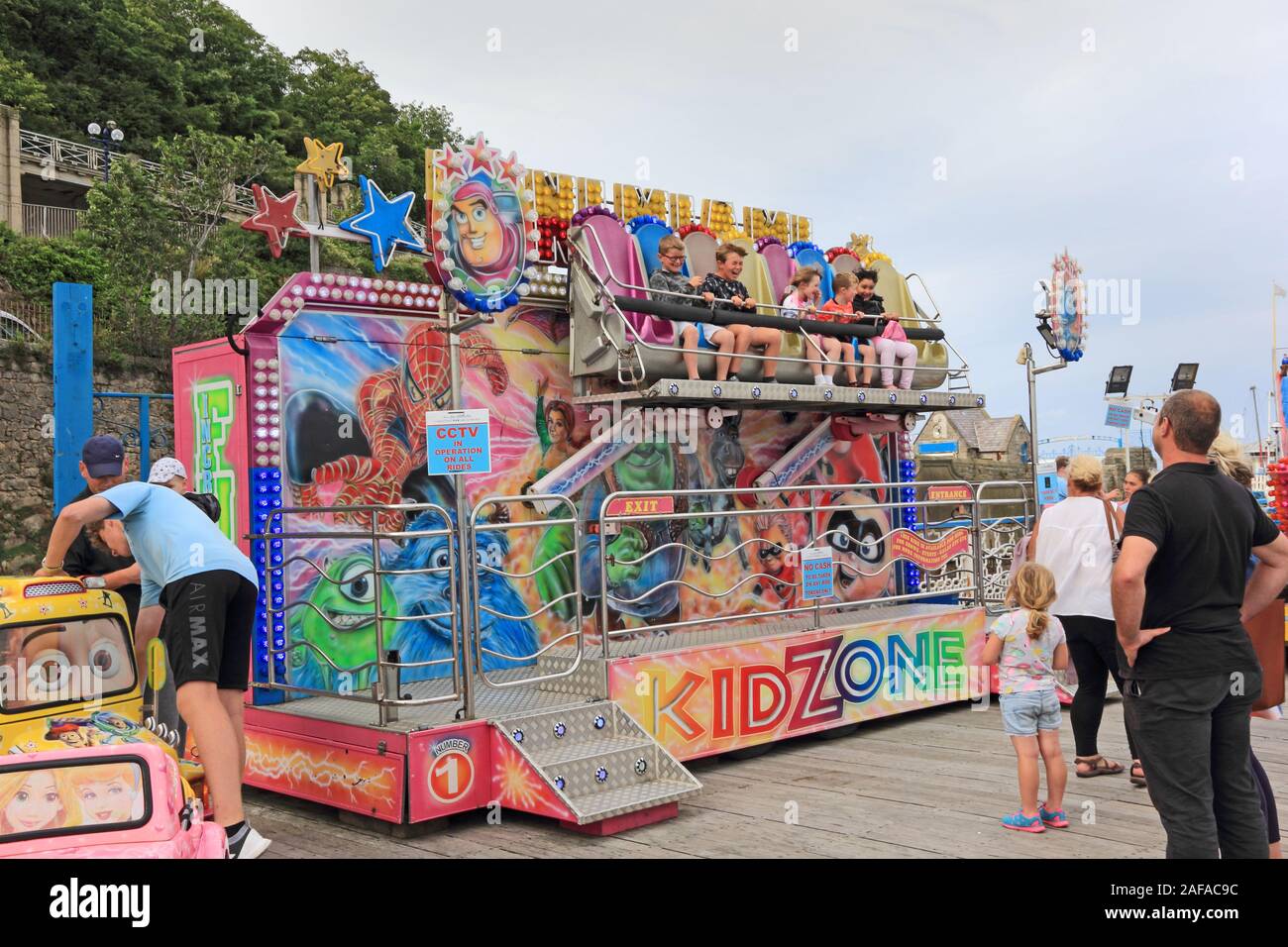 Traditional fairground ride on Llandudno Pier Stock Photo - Alamy