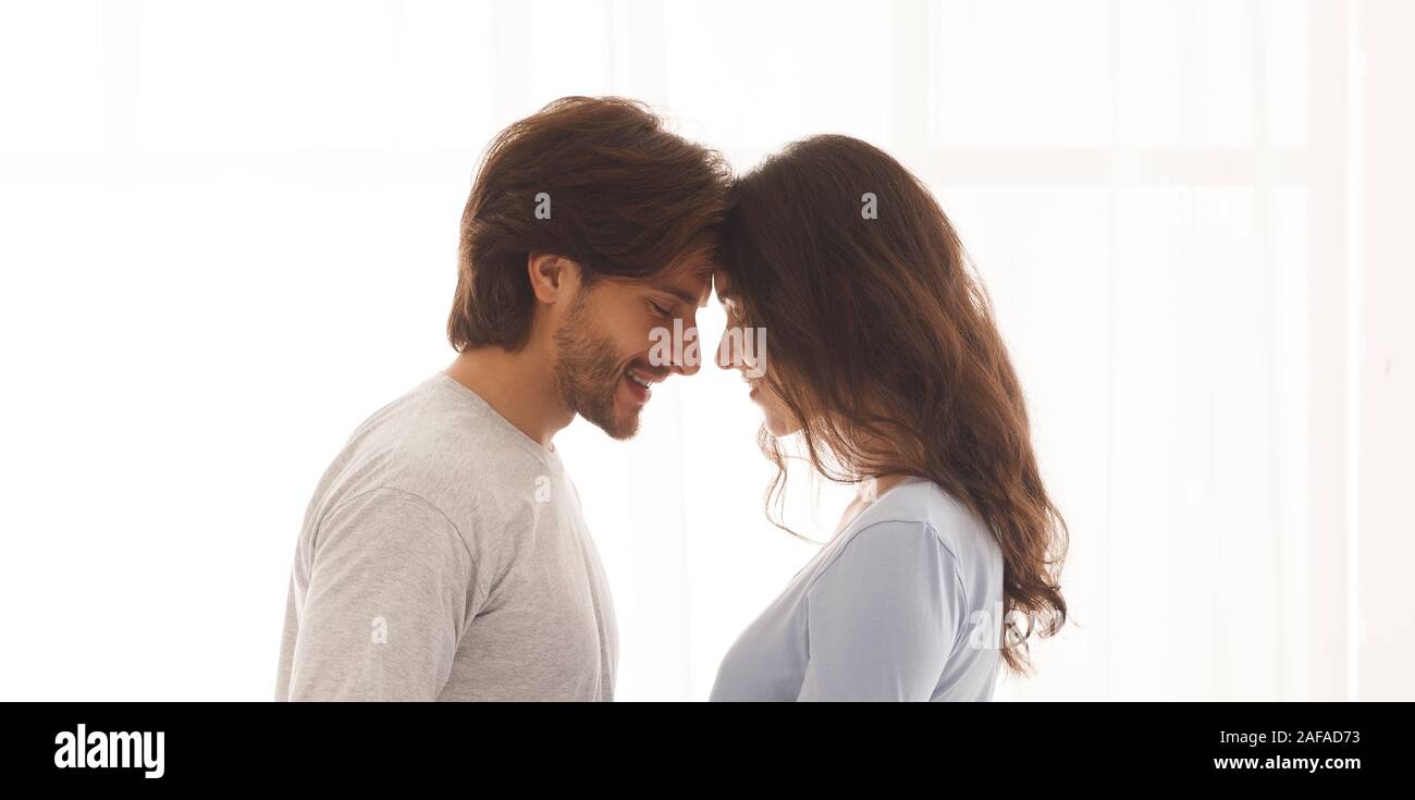 Two people foreheads touching hi-res stock photography and images - Alamy