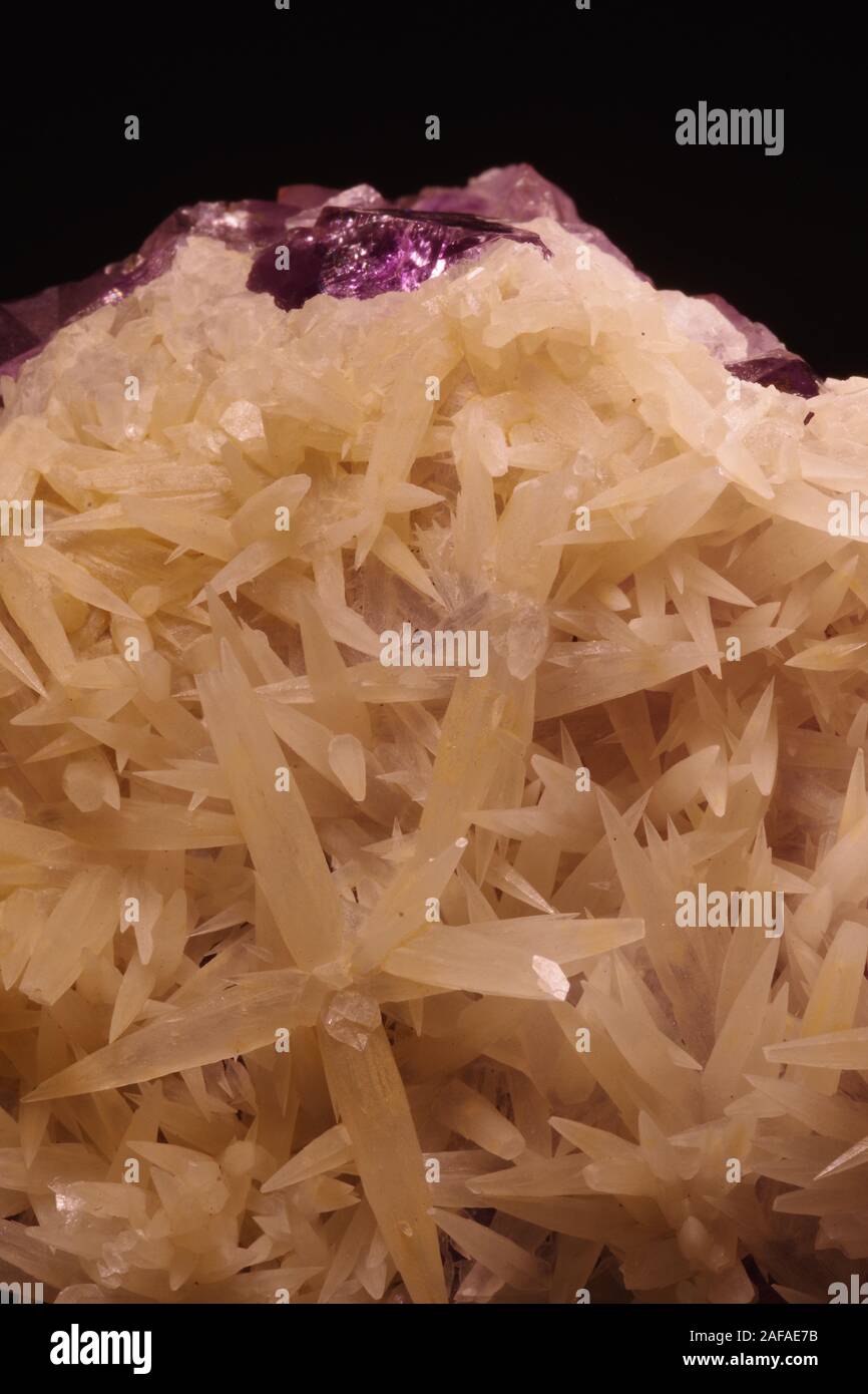 Angular Calcite Mineral needles growing over Purple Amethyst. Crystal ...