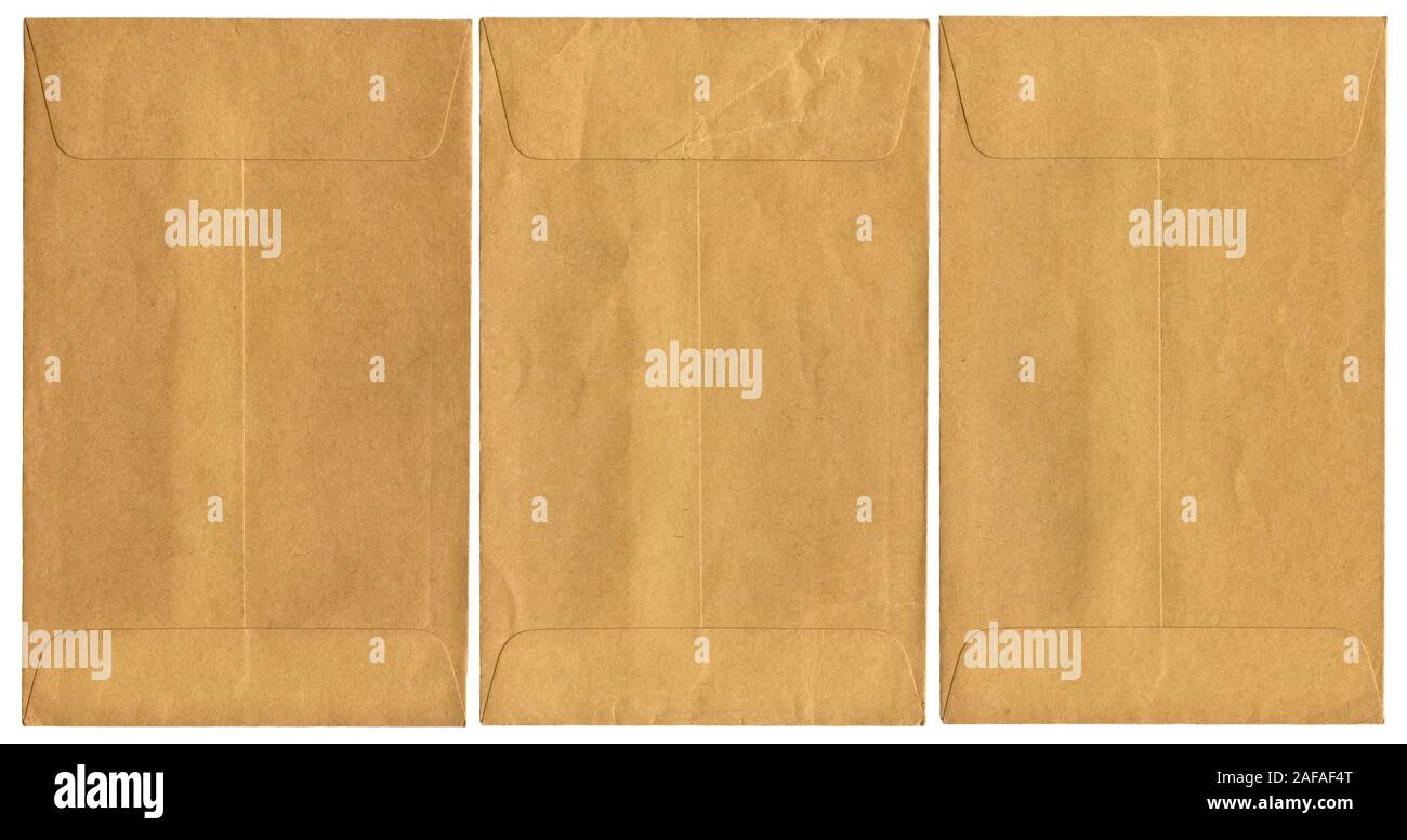 Three old vintage brown colored paper envelopes from 1968 on an ...