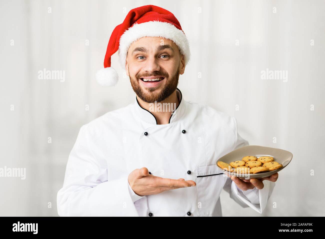 Man holding biscuits hi-res stock photography and images - Alamy