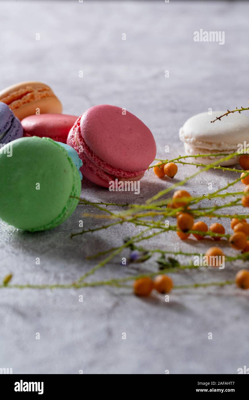 differnt color macaroons on a marble background Stock Photo - Alamy