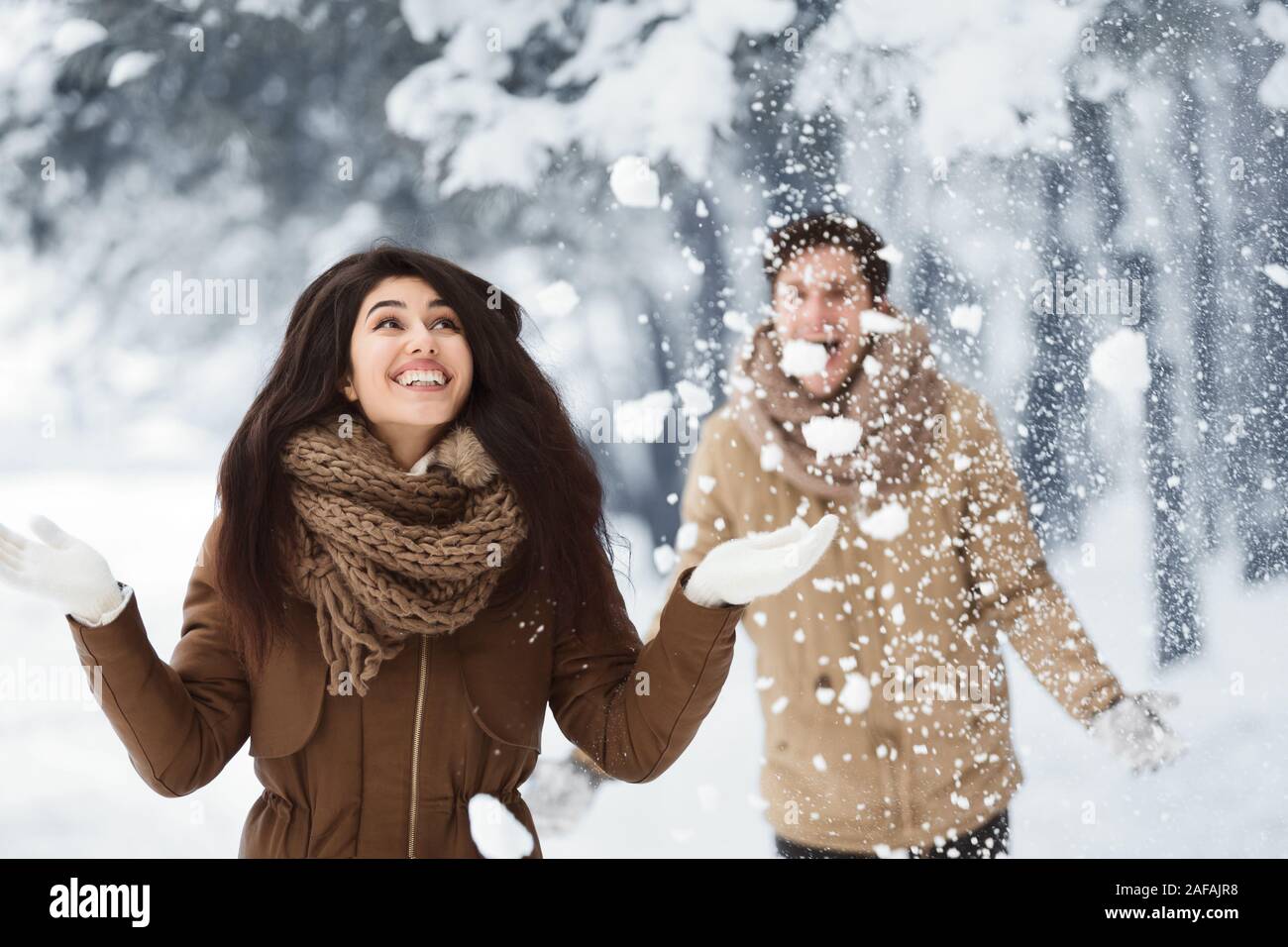 Man throwing snow girl hi-res stock photography and images - Alamy