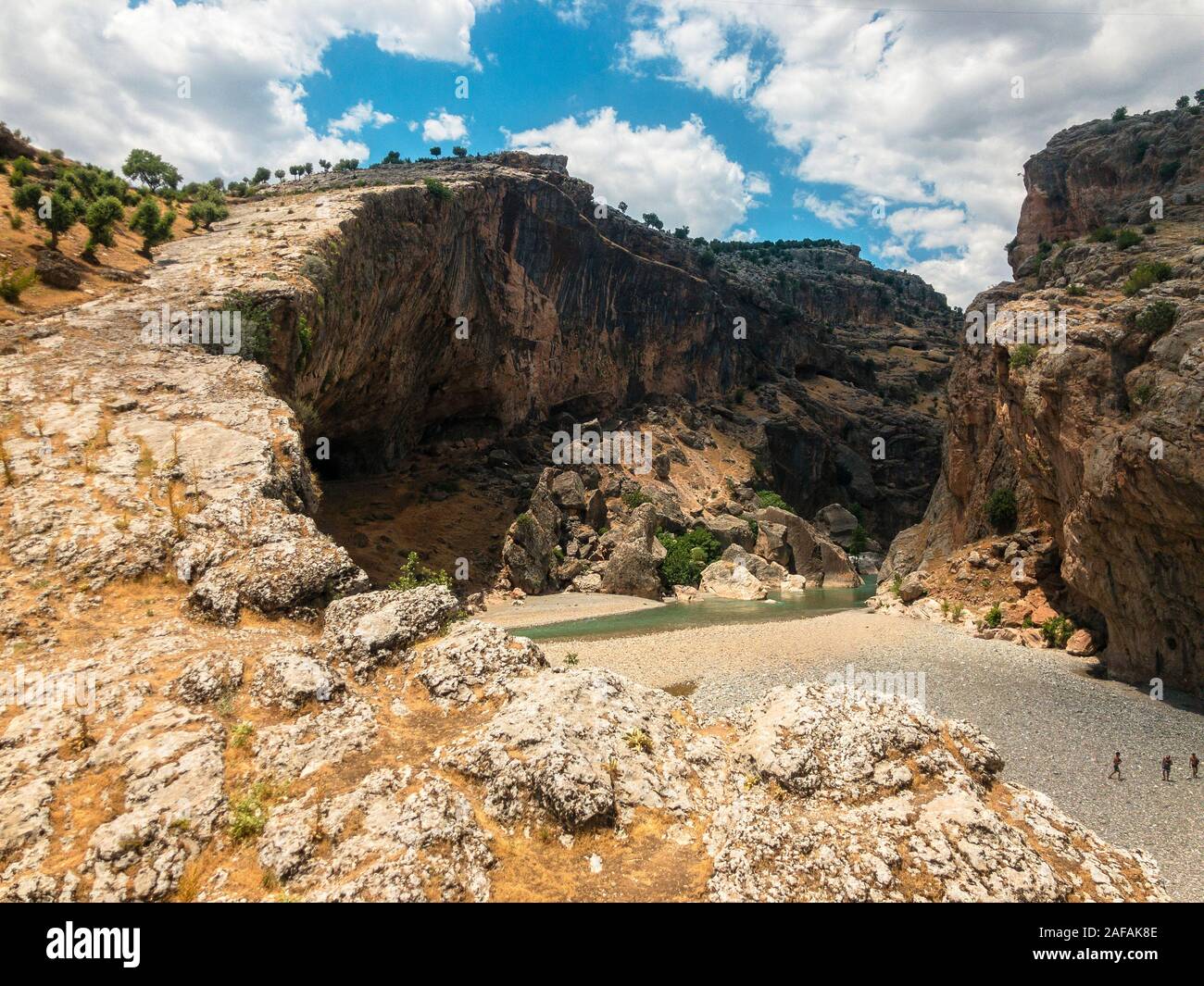 Panoramic view of the gorge with prehistoric caves over the the wide ...