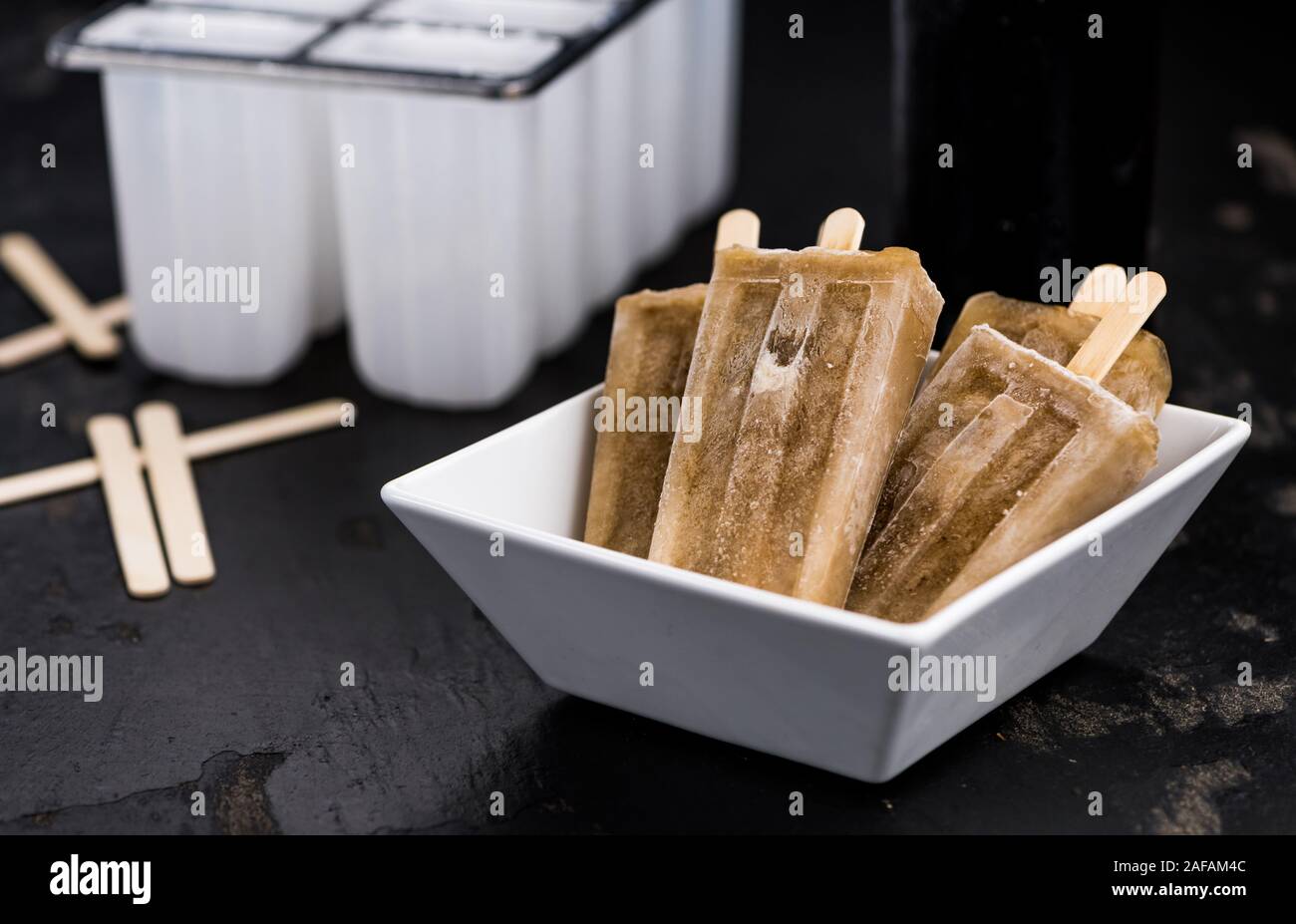 Cola Popsicles (selective focus) on a vintage background as detailed ...