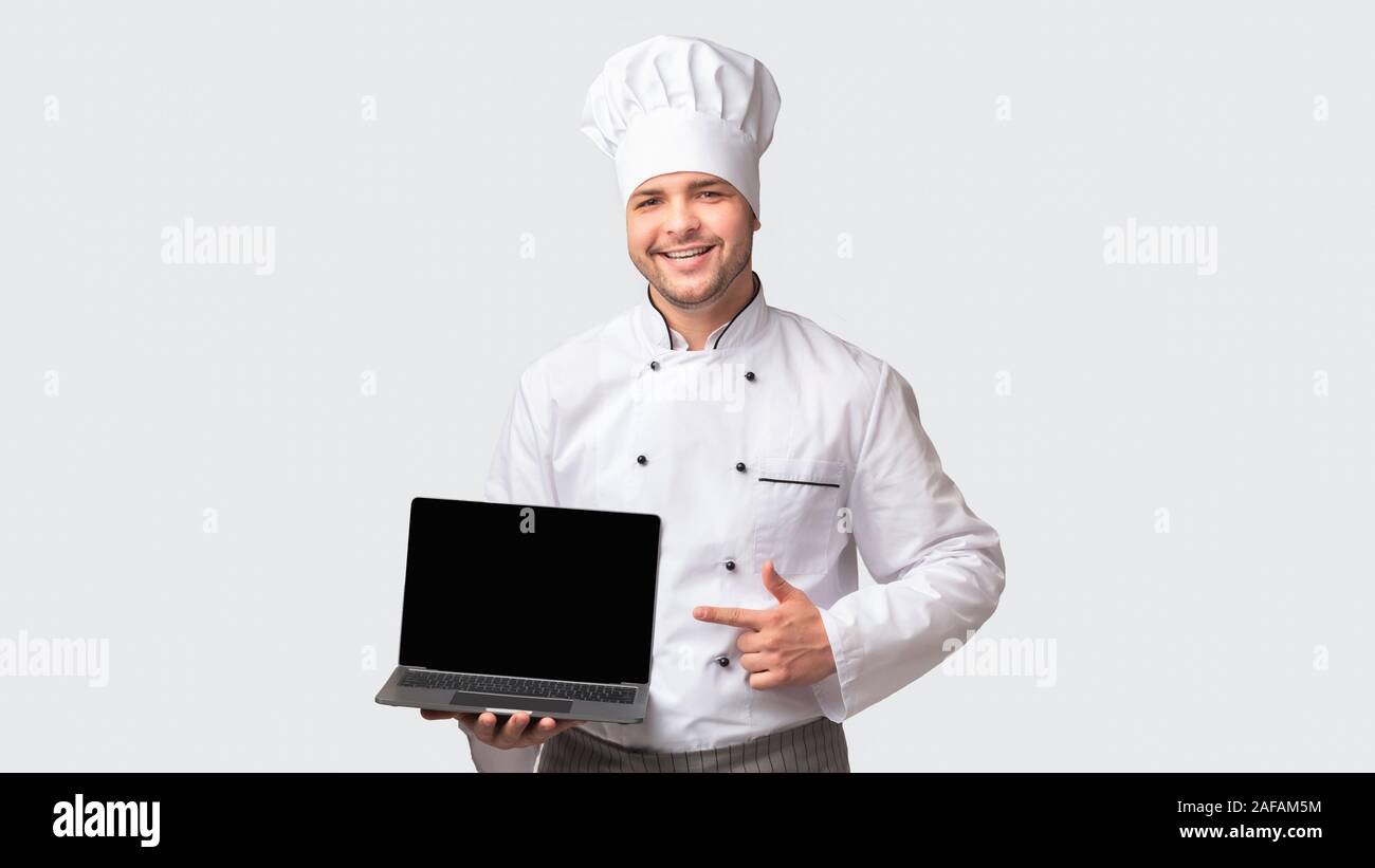 Chef Man Holding Laptop With Blank Screen Standing, White Background ...