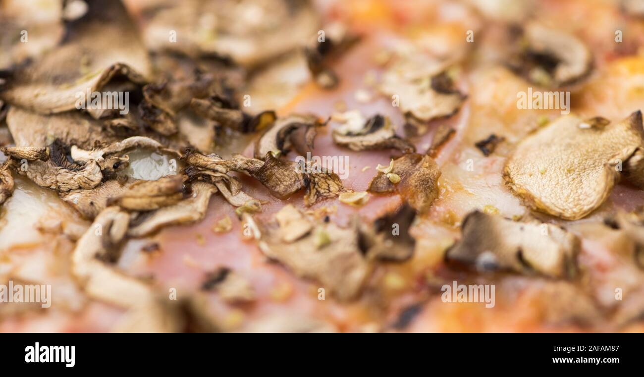 Fresh made Pizza full screen macro shot for use as background image or ...