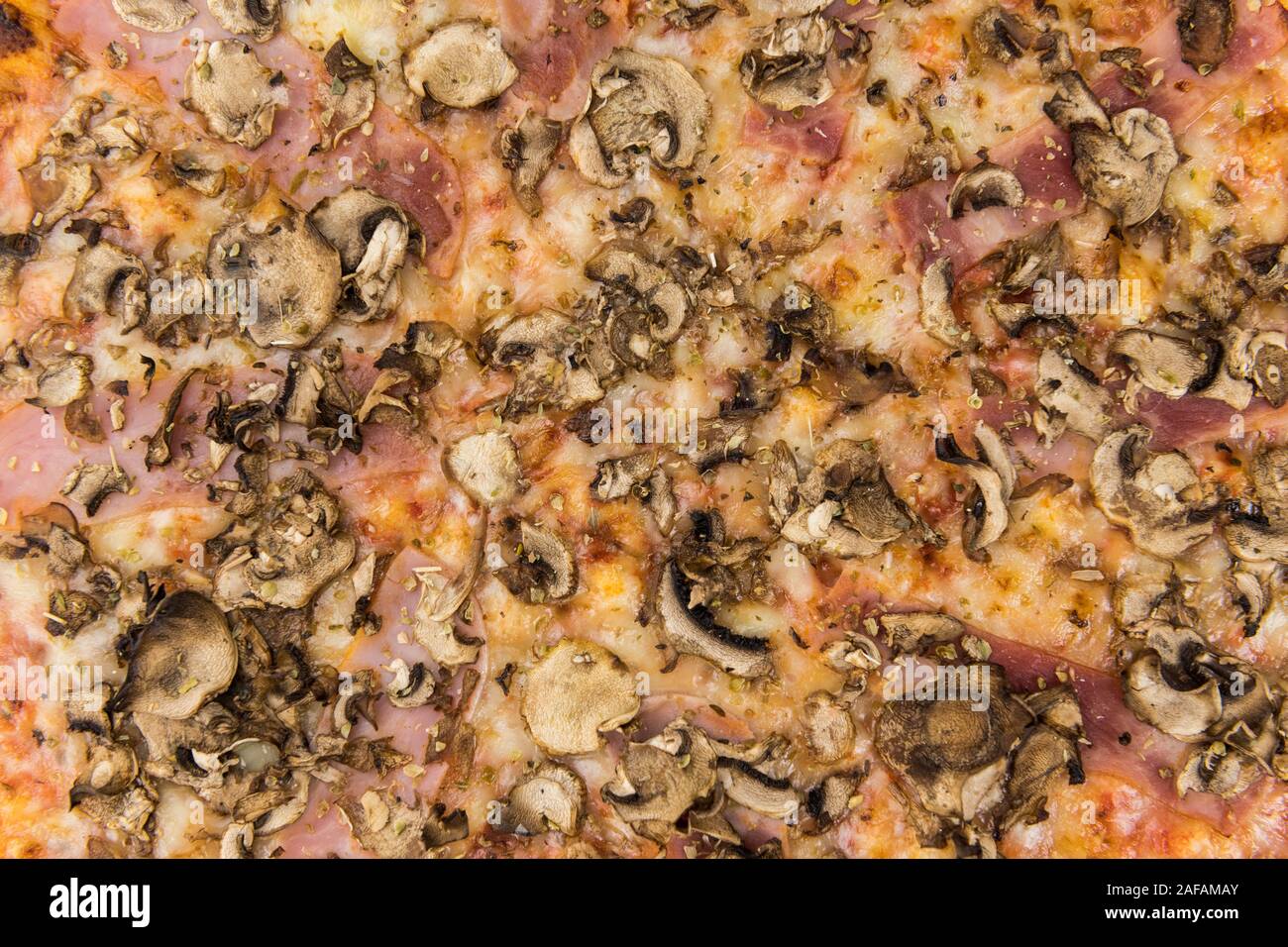 Fresh made Pizza full screen macro shot for use as background image or ...
