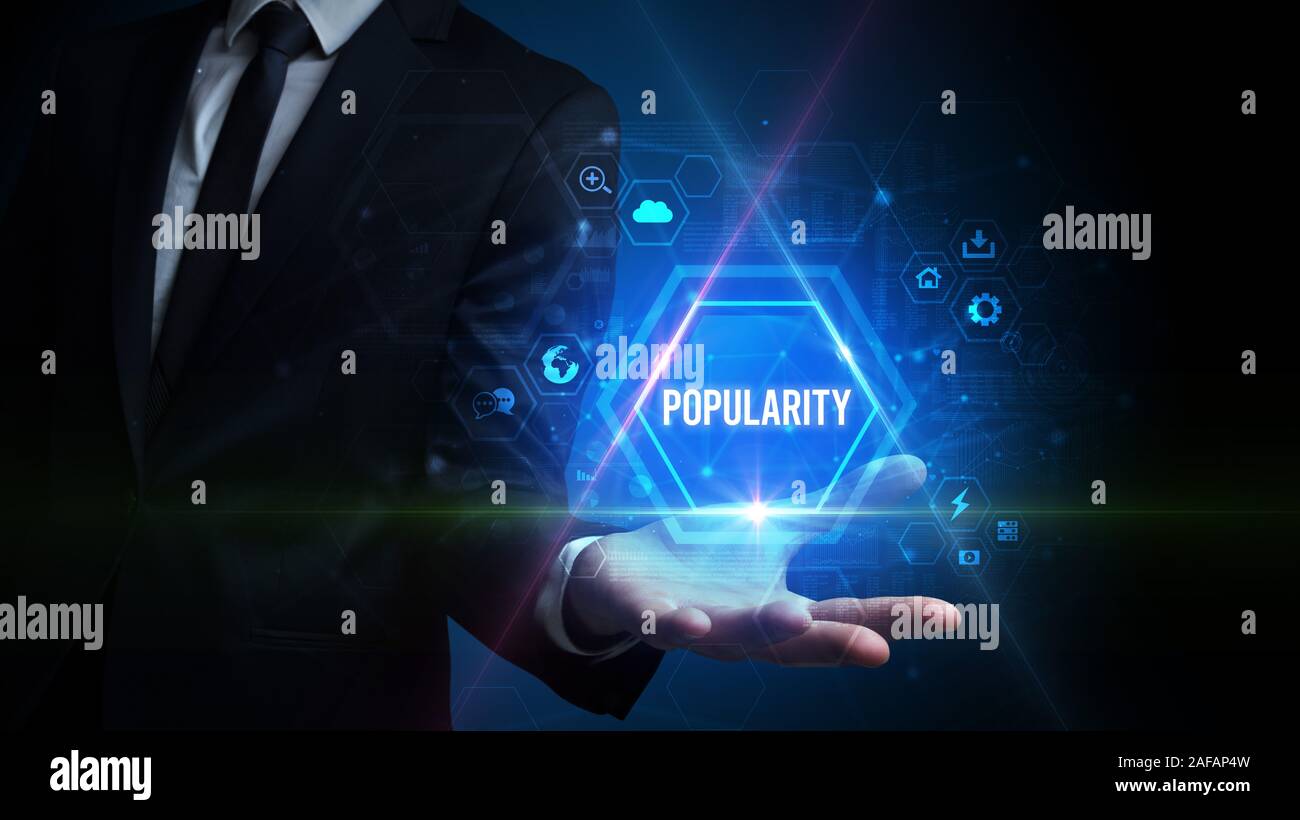 Man hand holding POPULARITY inscription, social media concept Stock ...