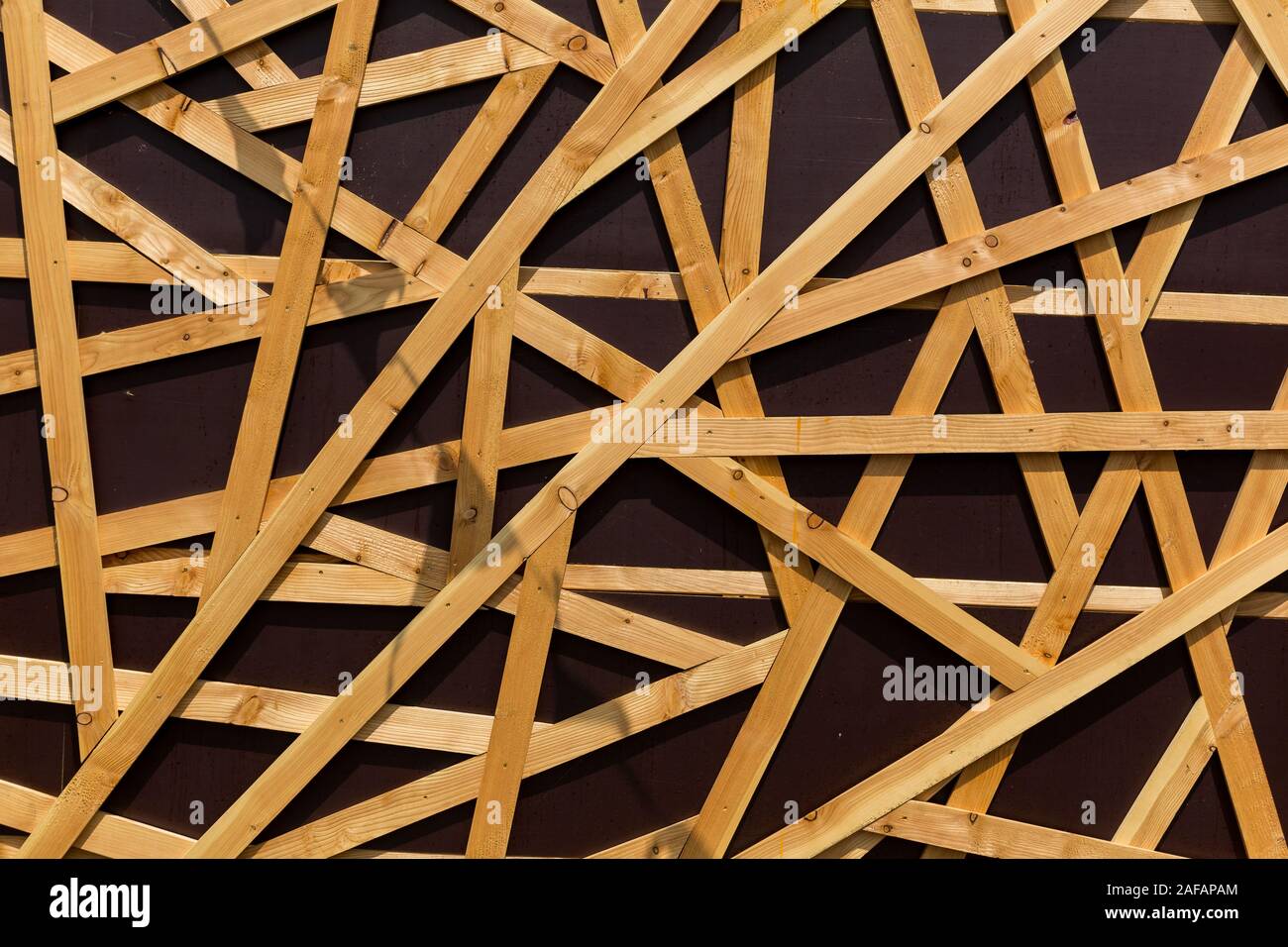 Wooden stick pattern isolated on brown background Stock Photo - Alamy