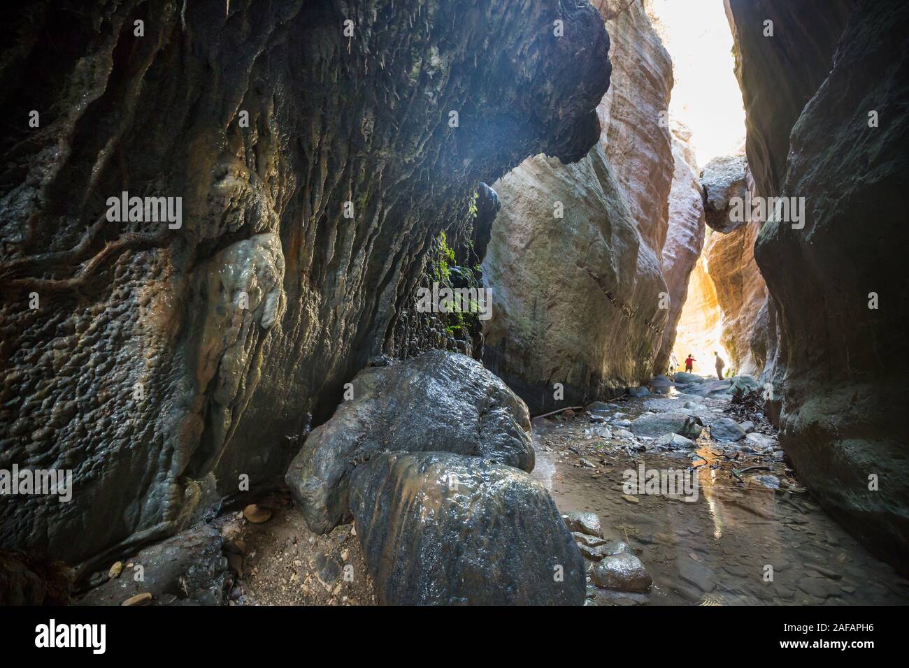 Tourist in Avakas Gorge. Paphos District, Cyprus. Famous small canyon ...