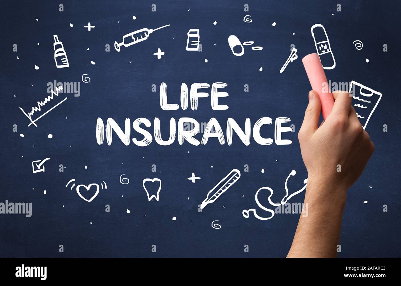 Hand drawing LIFE INSURANCE inscription with white chalk on blackboard ...