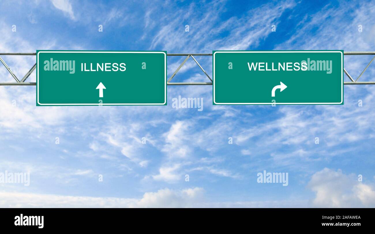Road sign to illness and wellness Stock Photo - Alamy