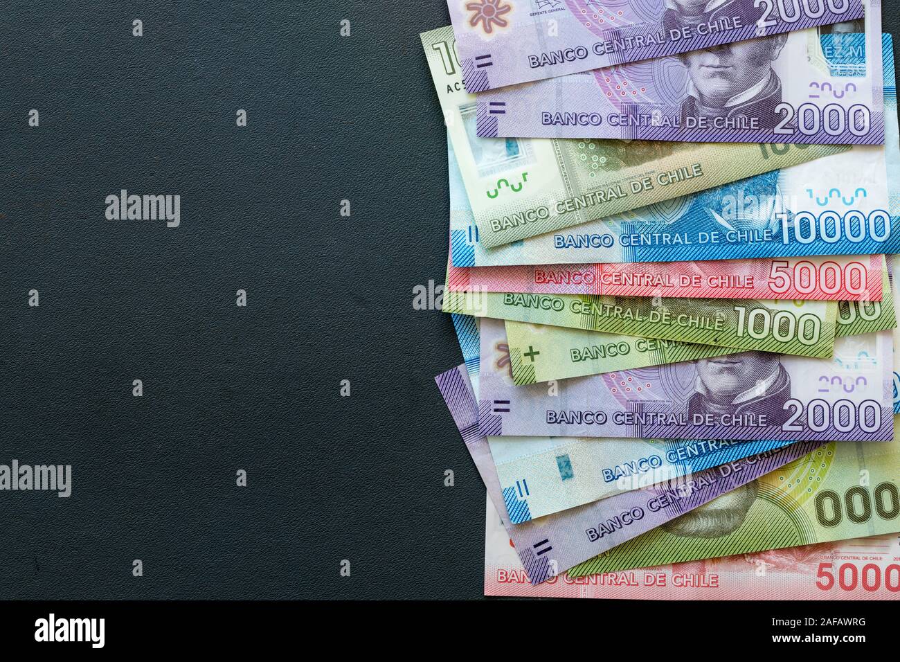 Chilean pesos banknotes of different value. Place for text Stock Photo ...