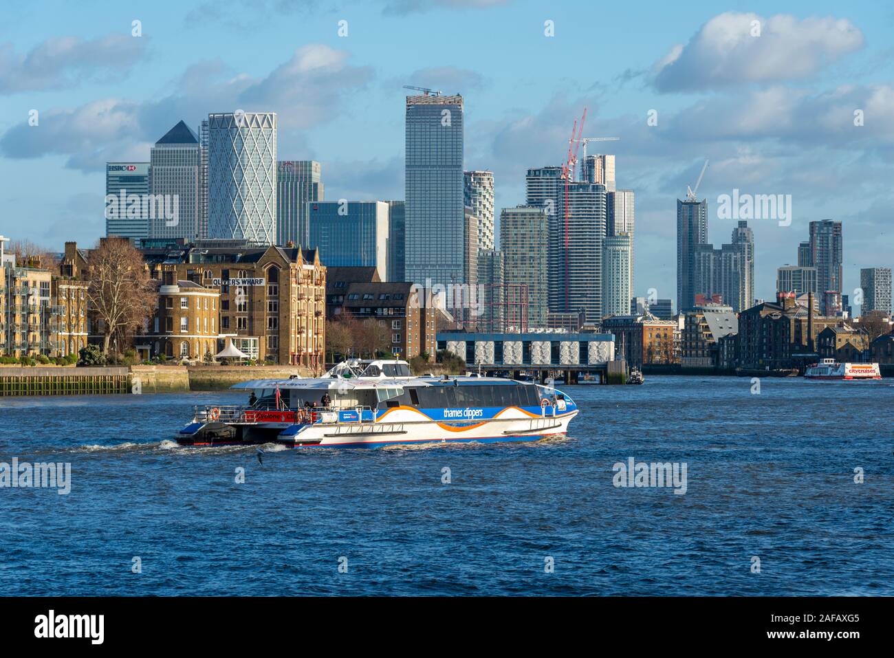 Thames Clippers riverbus on Wapping stretch of River Thames, London, UK ...