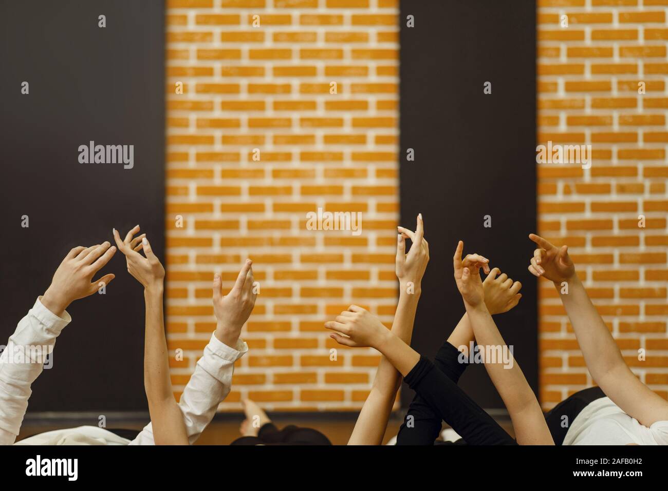 Contemporary dance performers hands in studio Stock Photo - Alamy