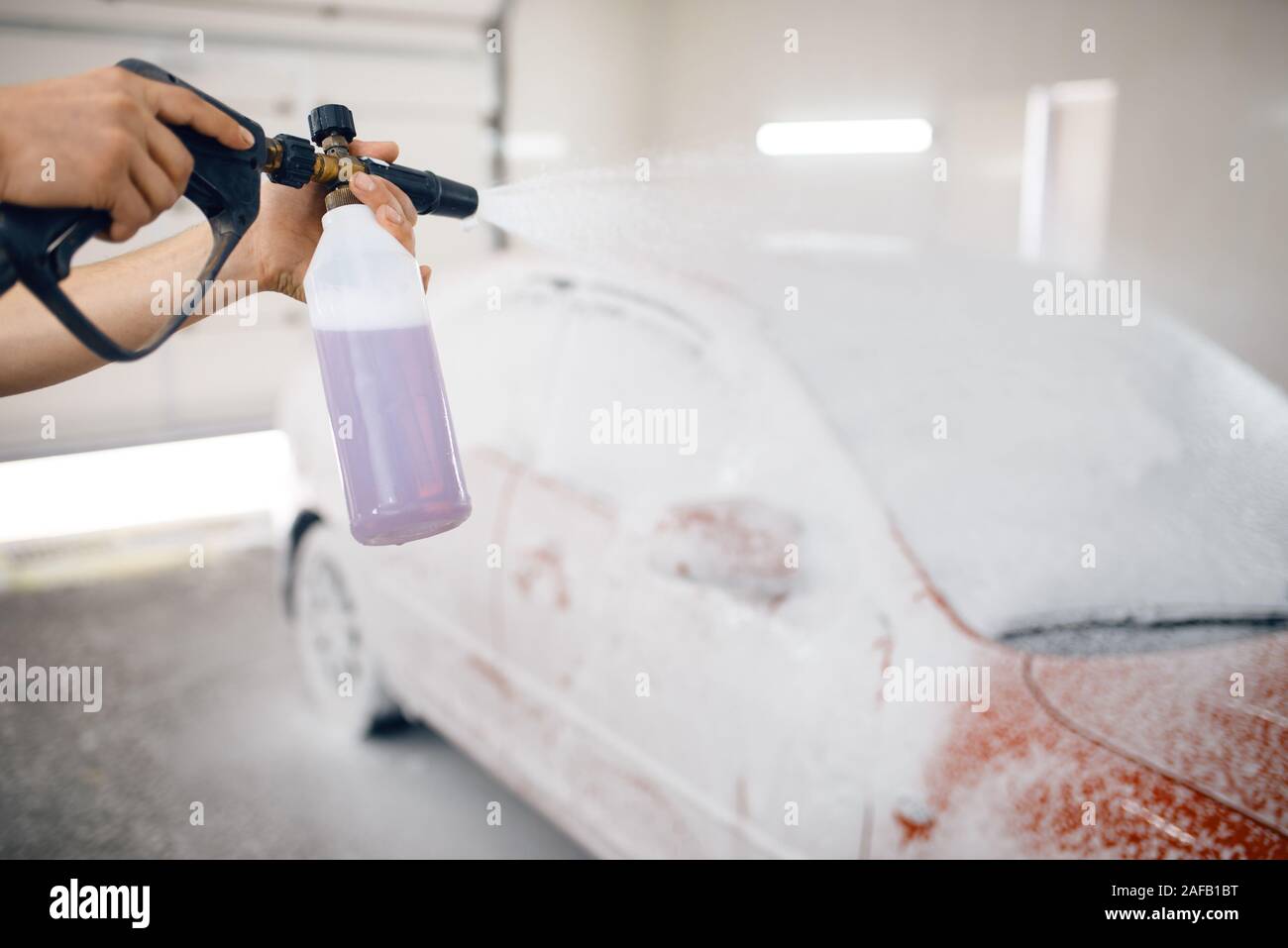 Female Washer Applies Foam To Automobile Car Wash Stock Photo Alamy