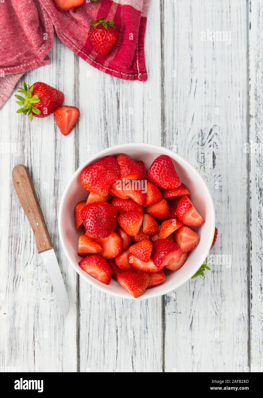 Strawberries (Chopped) on a vintage background as detailed close-up ...