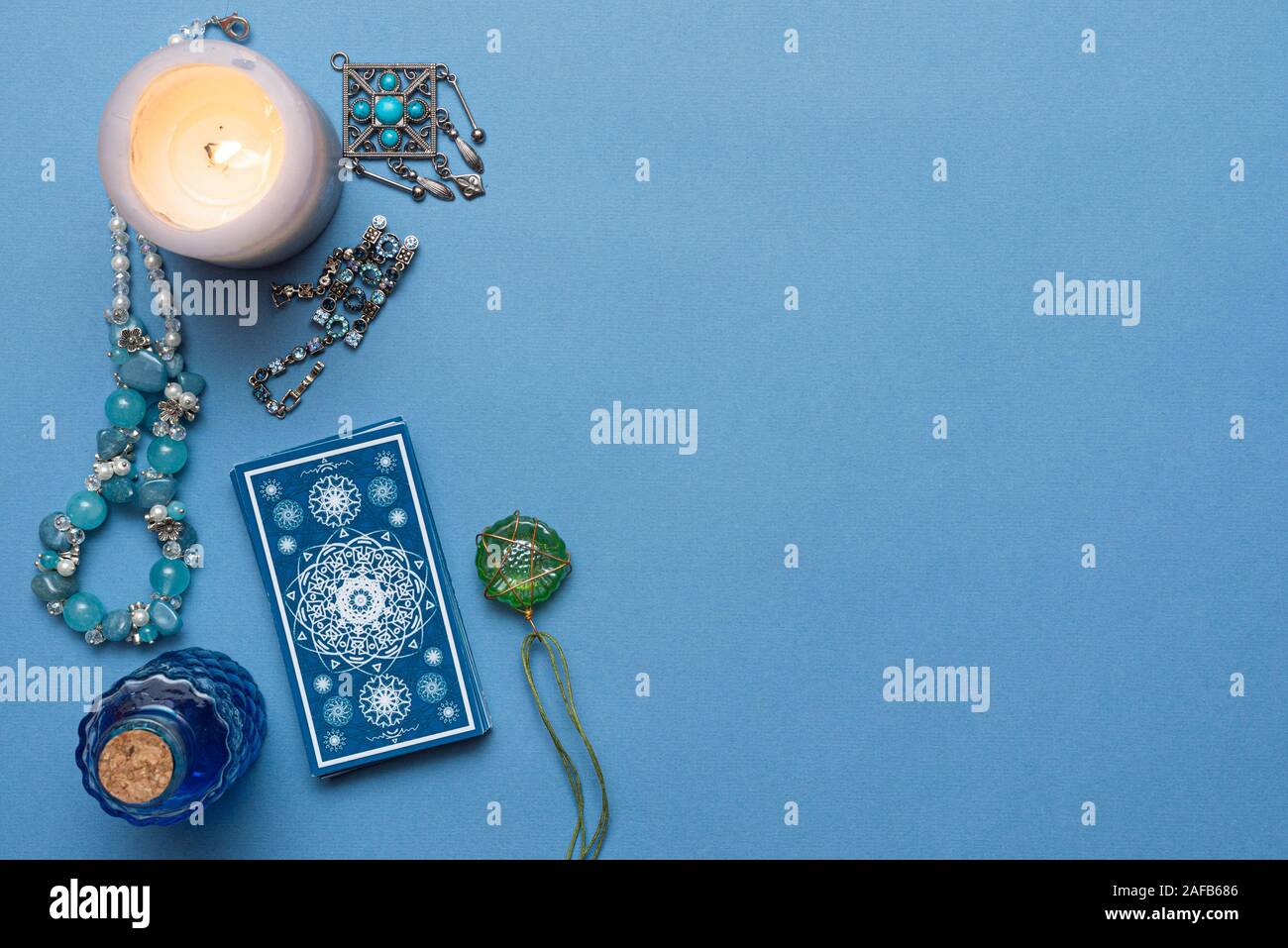 Blue tarot cards deck on blue background with copy space Stock Photo ...