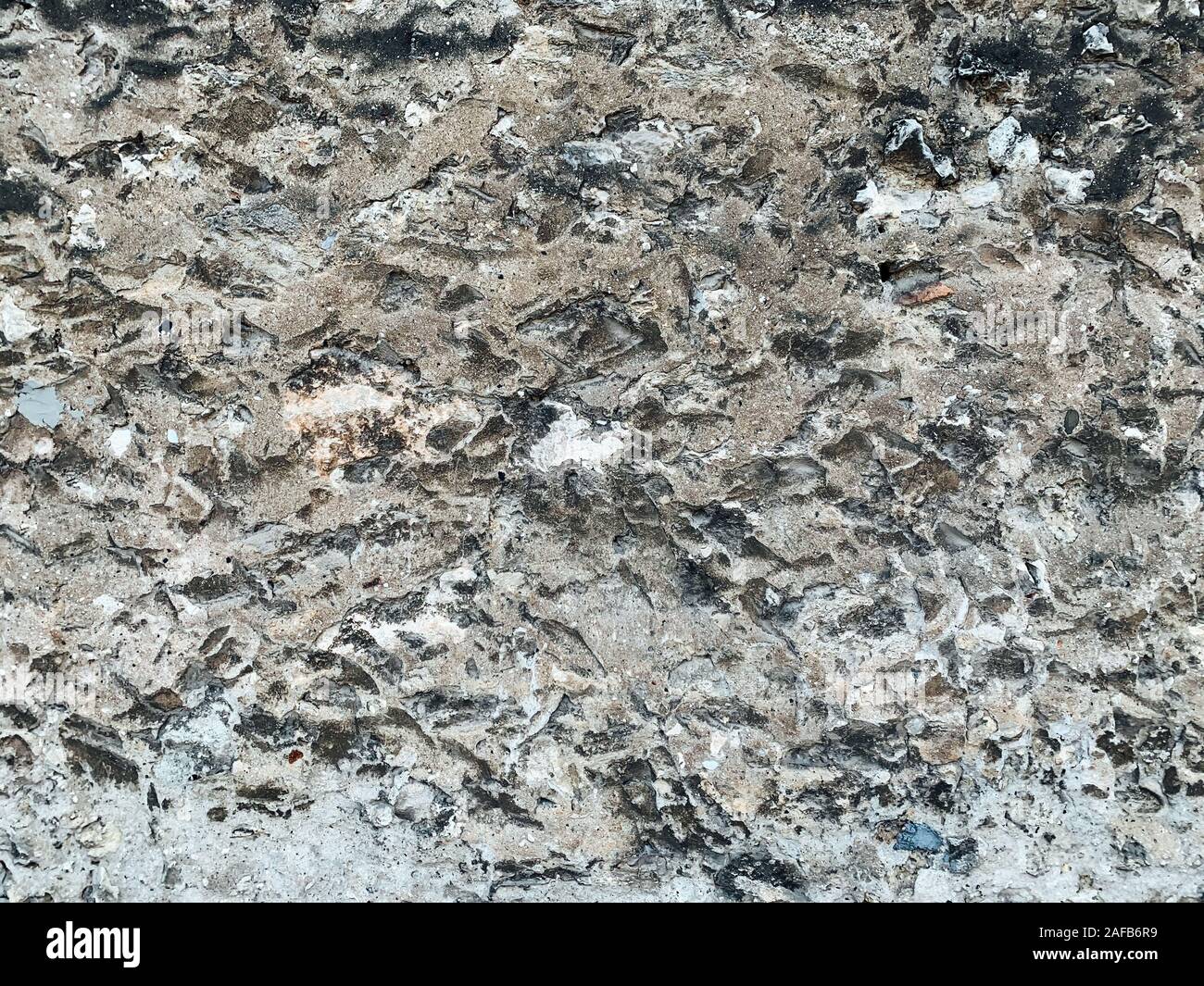 old vintage grey stone wall texture as background Stock Photo - Alamy